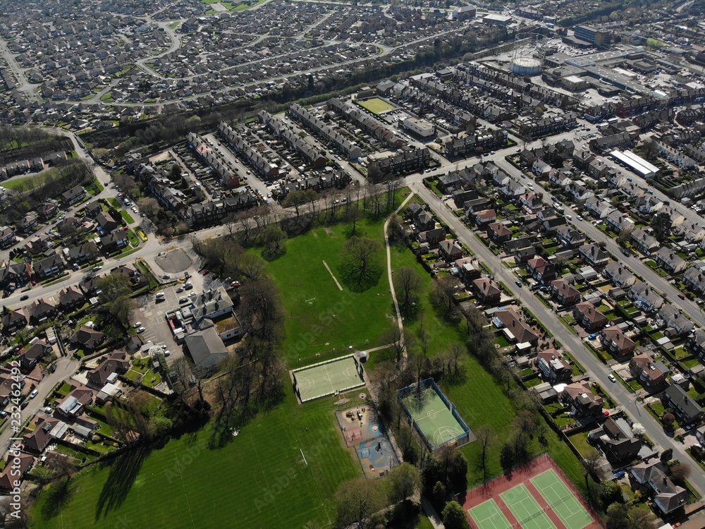 Typical UK Town aerial photo showing rows of houses, roads, parks and ...