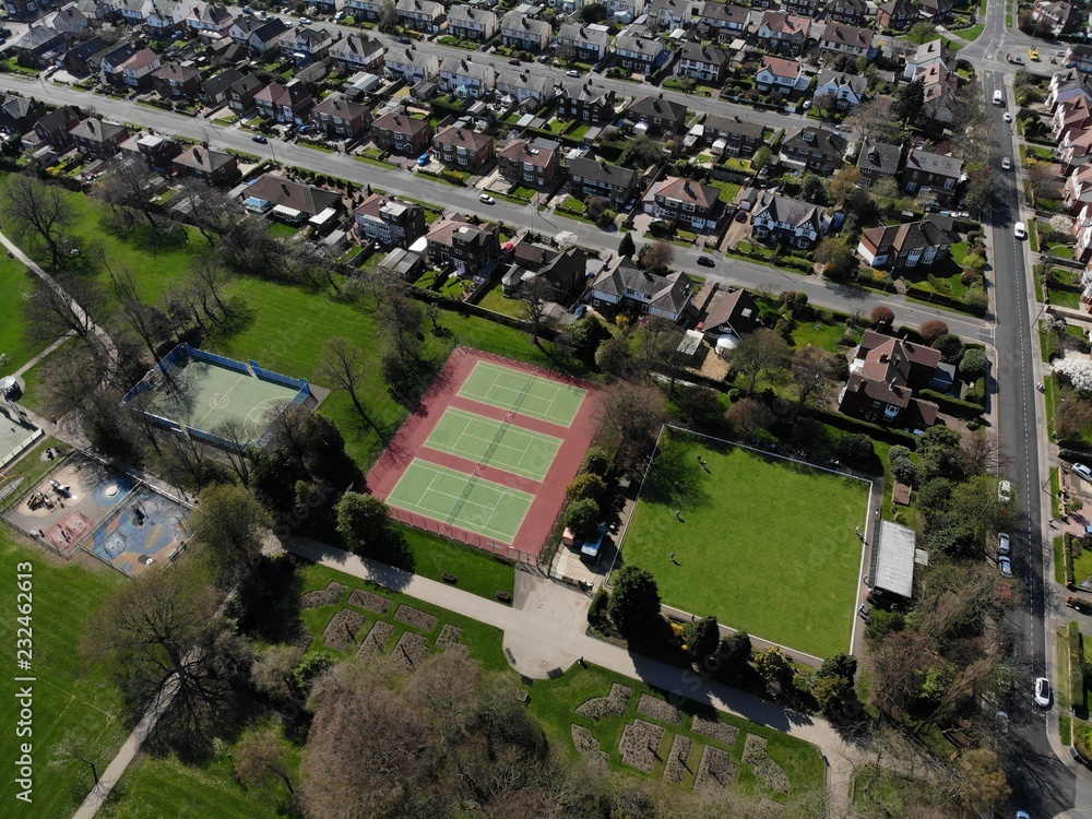 Typical UK Town aerial photo showing rows of houses, roads, parks and ...