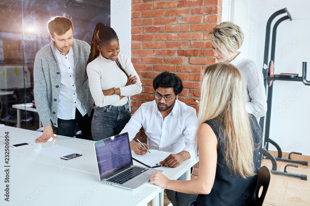 successful team reving plans for the future in the room with loft ...