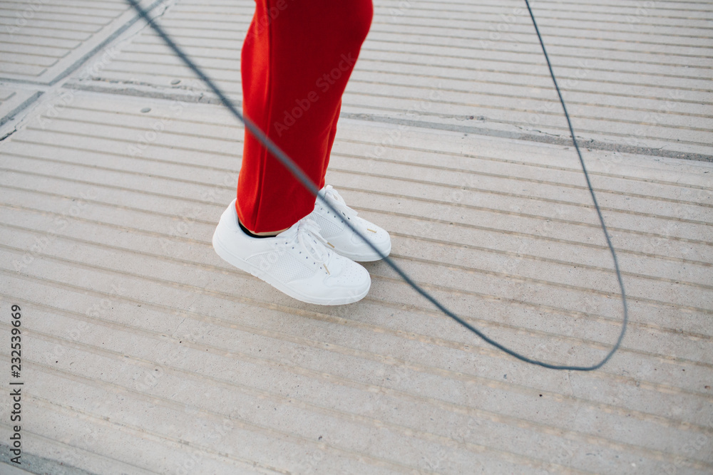 Legs of jumping sportsman Stock Photo | Adobe Stock