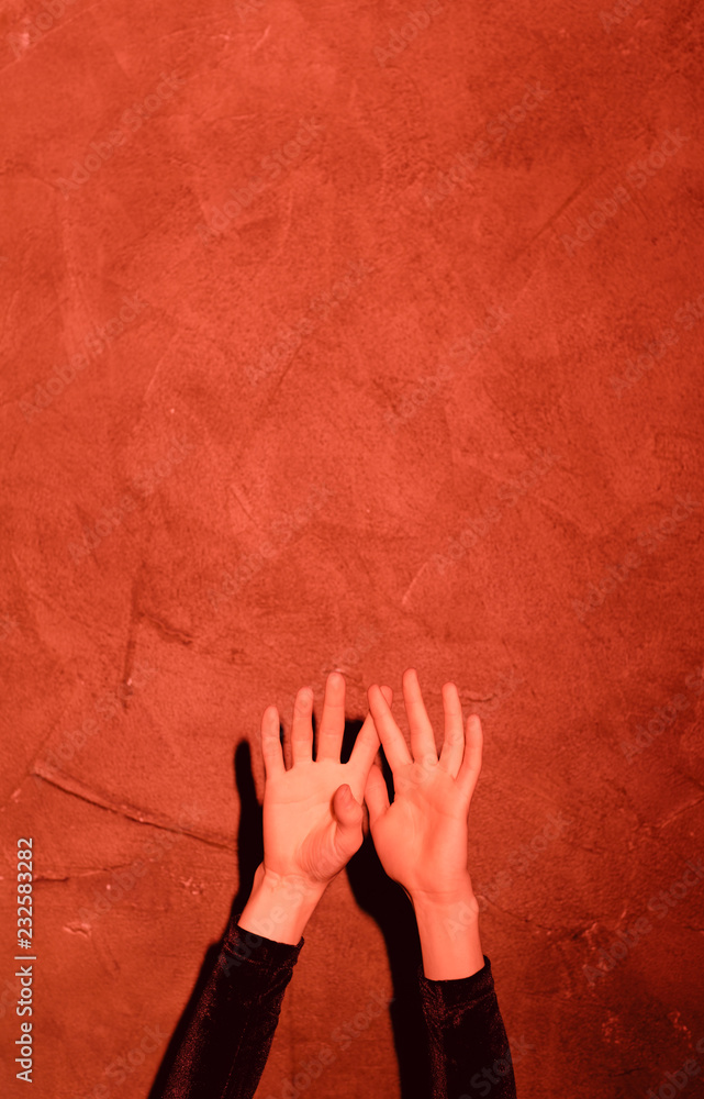 hands on the red background Stock Photo | Adobe Stock