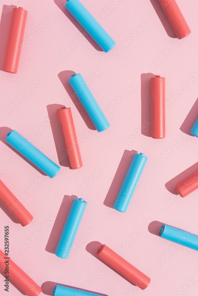 Blue and red batteries Stock Photo | Adobe Stock