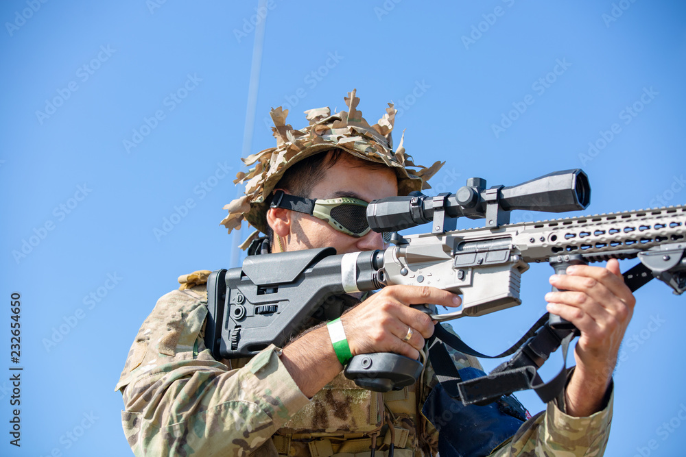 special forces, soldier assault rifle with silencer, optical sight ...
