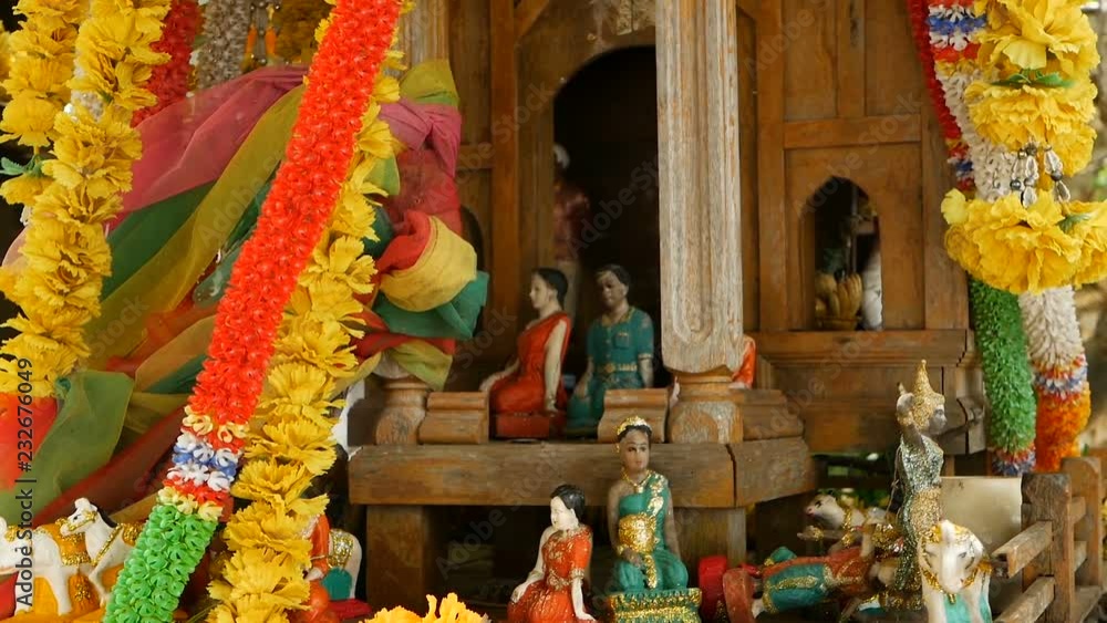 Wooden miniature guardian spirit house. Small buddhist temple shrine ...