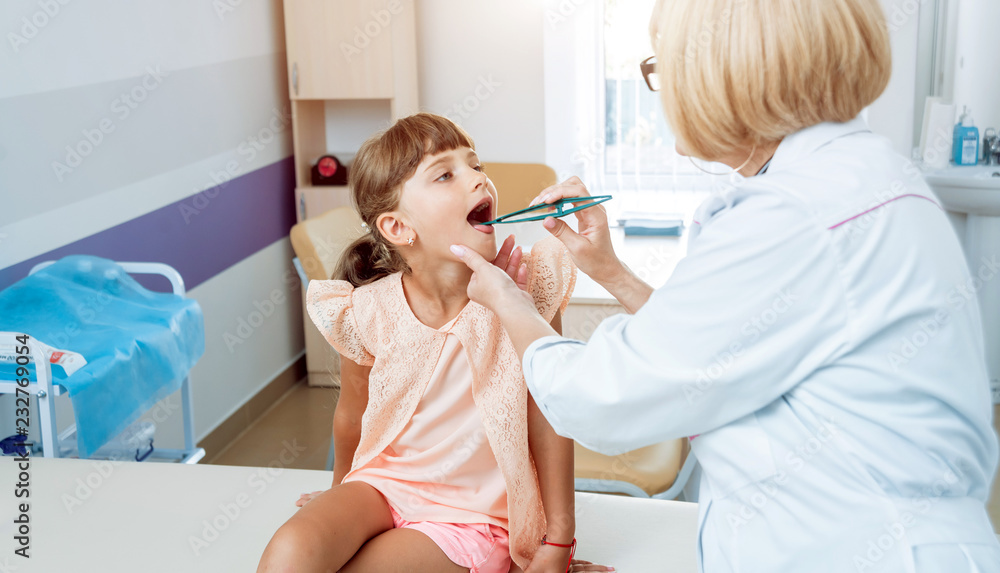 Friendly doctor pediatrician with patient child at clinic Stock Photo ...