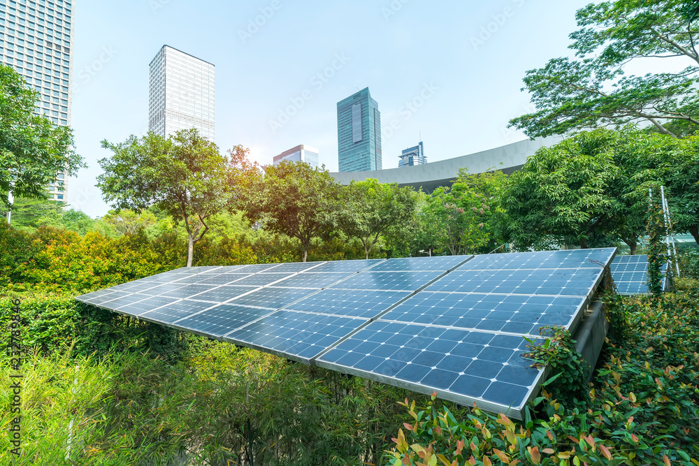 Ecological energy renewable solar panel plant with urban landscape ...