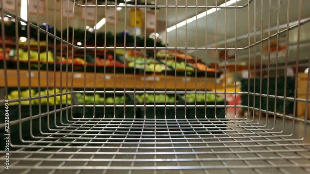 Shopping cart moving through grocery store สต็อกวิดีโอ | Adobe Stock