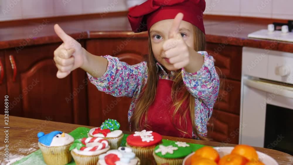A beautiful girl put up a big fingers of hands. Stock Video | Adobe Stock
