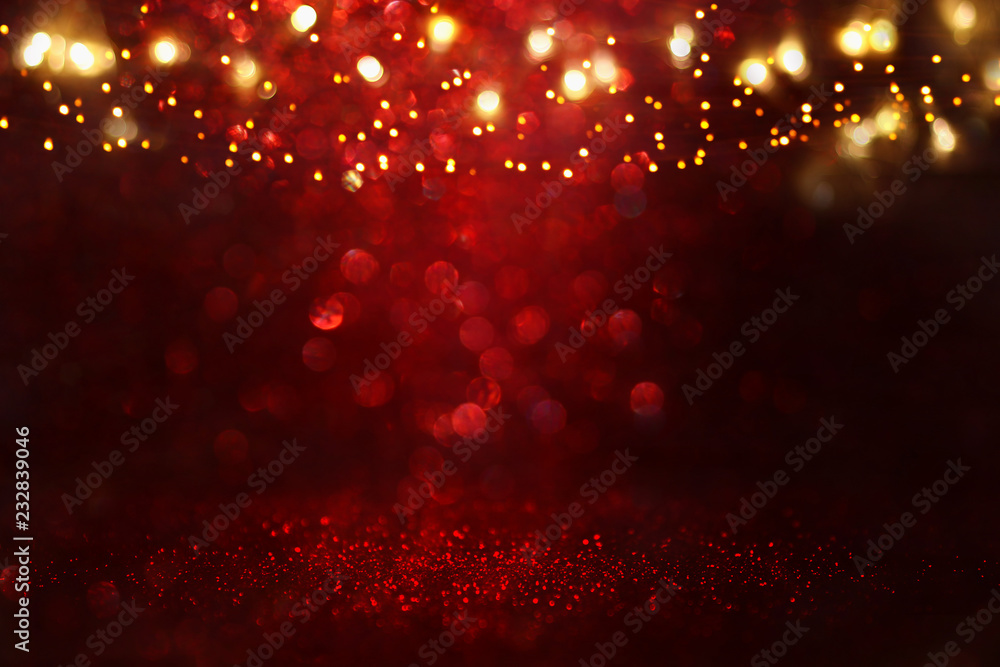 Red, black and gold glitter lights background. defocused. Stock Photo ...