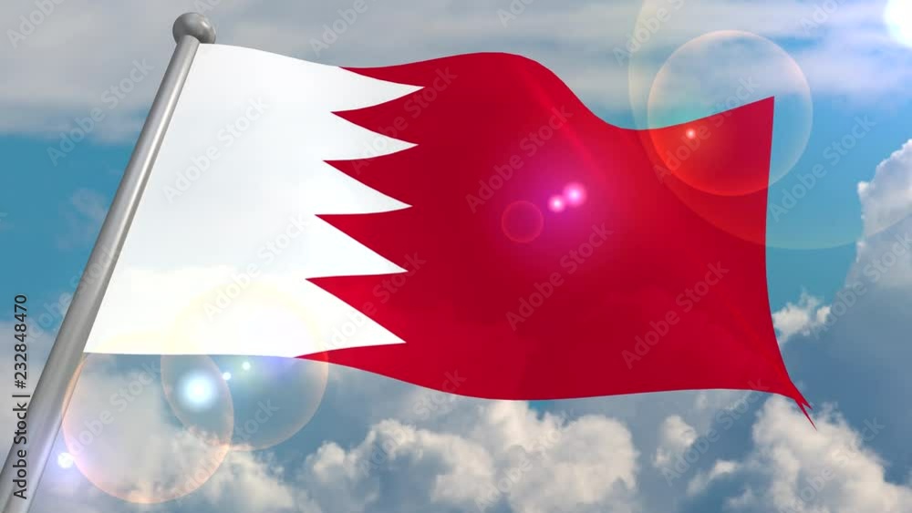 The flag of the state of Bahrain develops in the wind against a blue ...