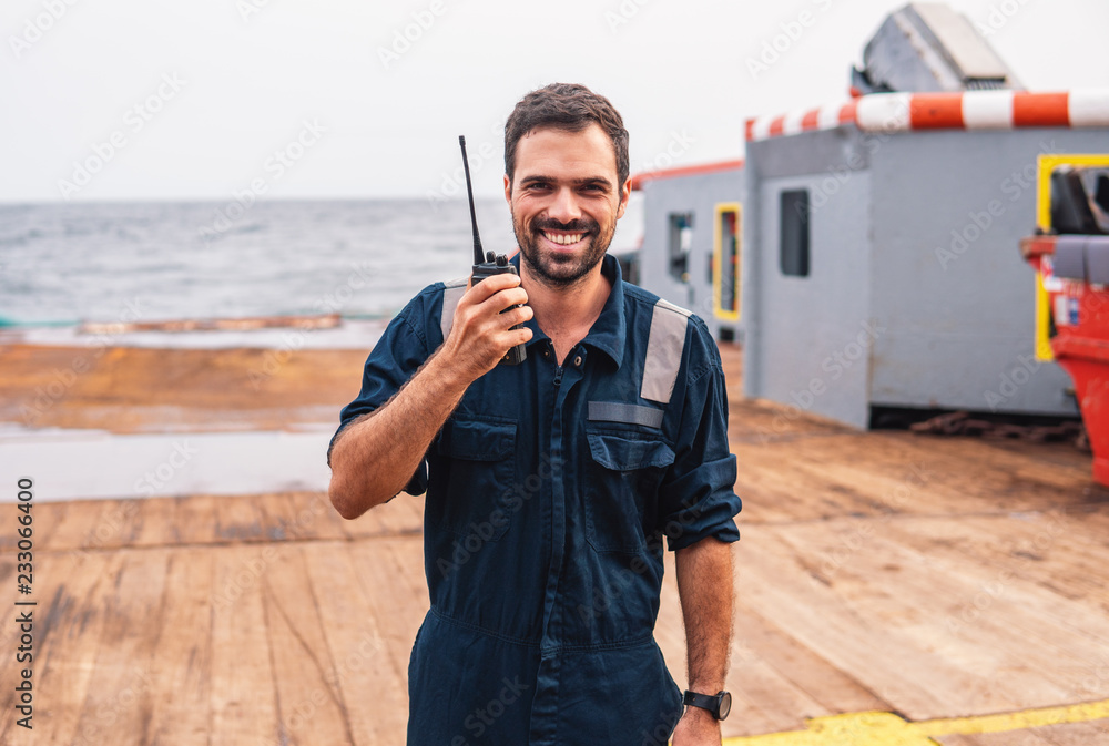 Marine Deck Officer or Chief mate on deck of vessel or ship . He holds ...