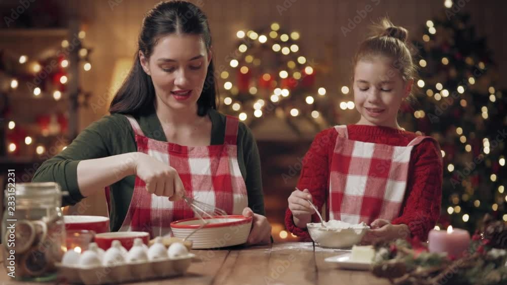 Merry Christmas and Happy Holidays. Family preparation holiday food ...