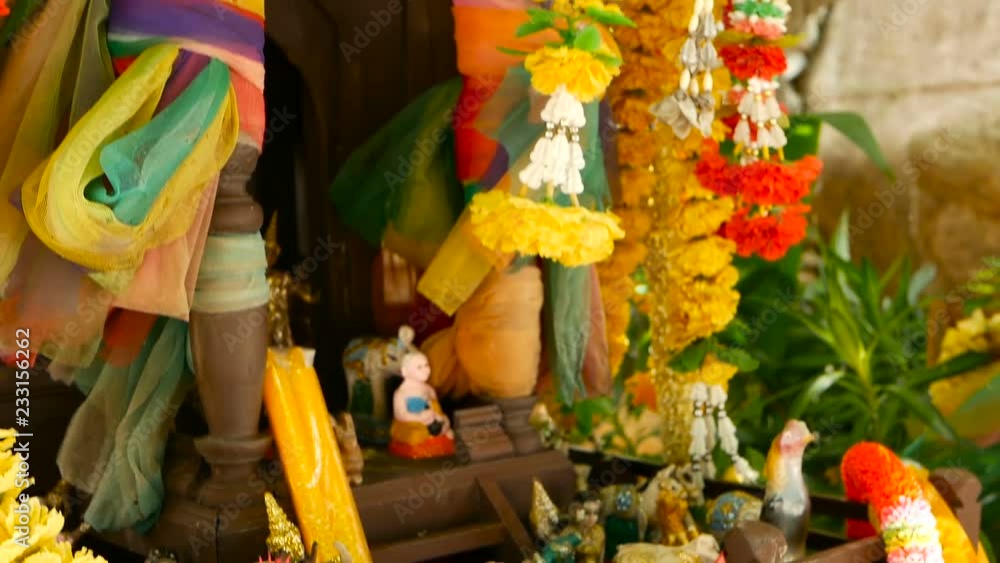 Wooden miniature guardian spirit house. Small buddhist temple shrine ...