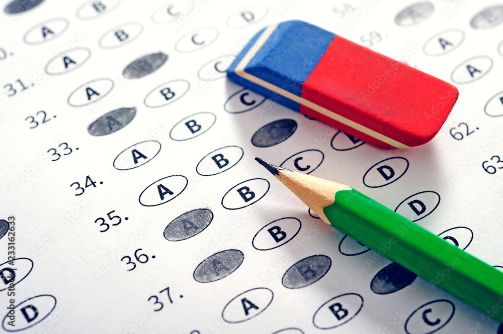 Test answer sheet with pencil. Examination test. Education concept ...