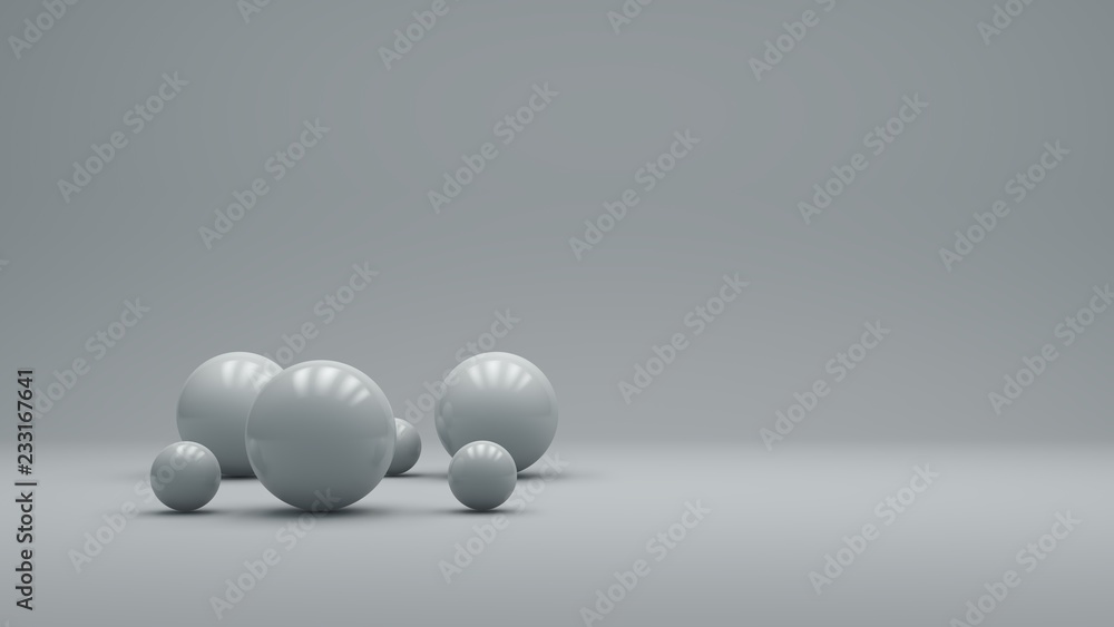 3d rendering of several sized reflected spheres inside a white studio ...
