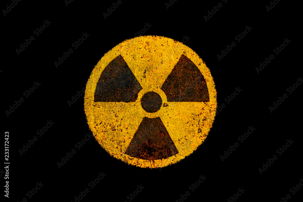 Round yellow and black radioactive (ionizing radiation) nuclear danger ...