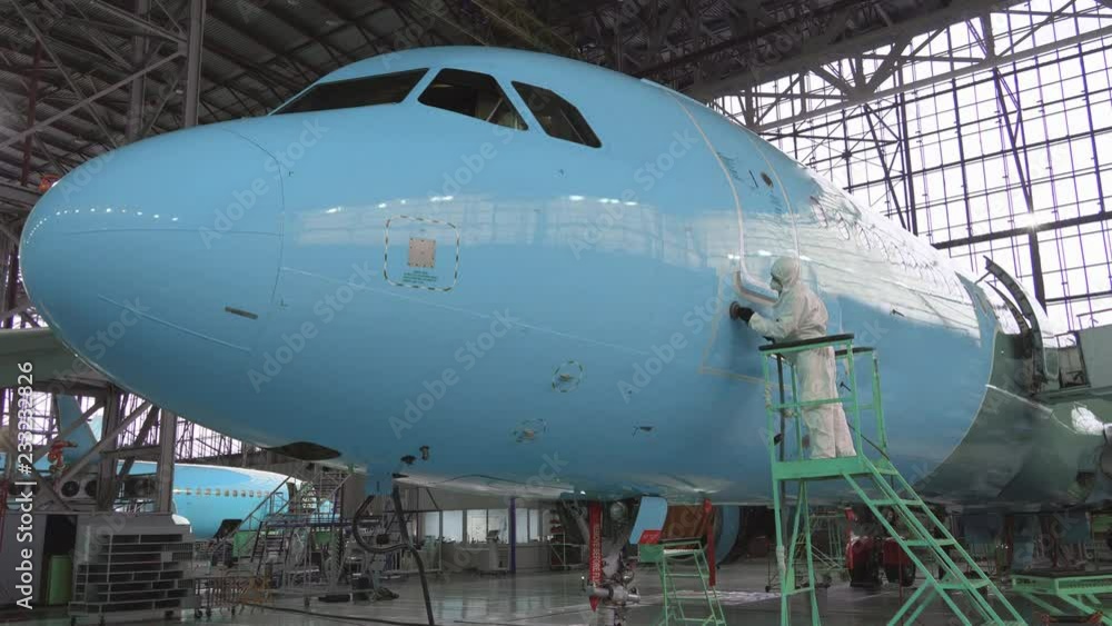 Repair of the aircraft fuselage. The color of the fuselage of the ...
