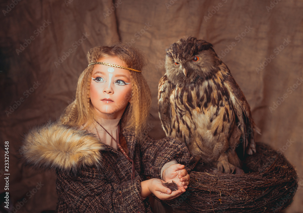 Girl in the style of boho with an owl. Boho chic hugs big owl Stock ...