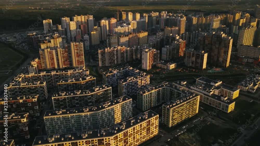 Aerial survey densely built area of new city. Microdistrict sun ...