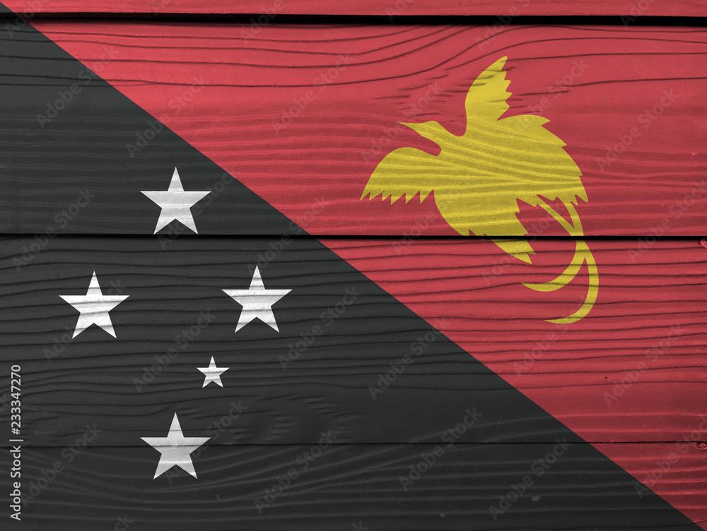 Flag of Papua New Guinea on wooden wall background. Grunge Papua New ...