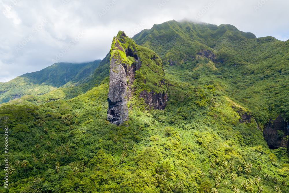 Rock with the shape of a Giant Tiki head on Raiatea island. Raiatea ...