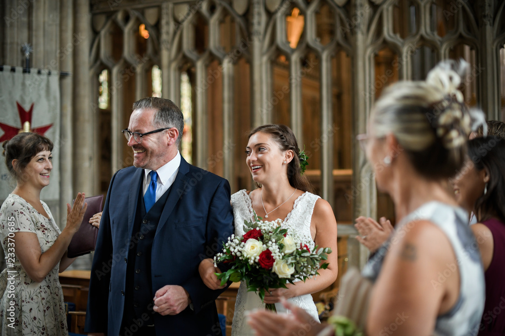 Father of the bride walking his daughter down the aisle Stock Photo ...