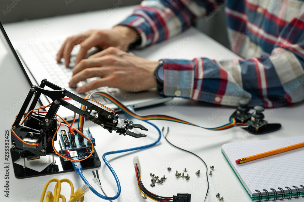 engineer working on robotics automation project Stock Photo | Adobe Stock