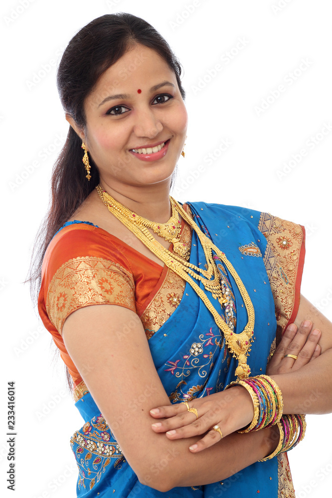 Young traditional indian woman against white background Stock Photo ...