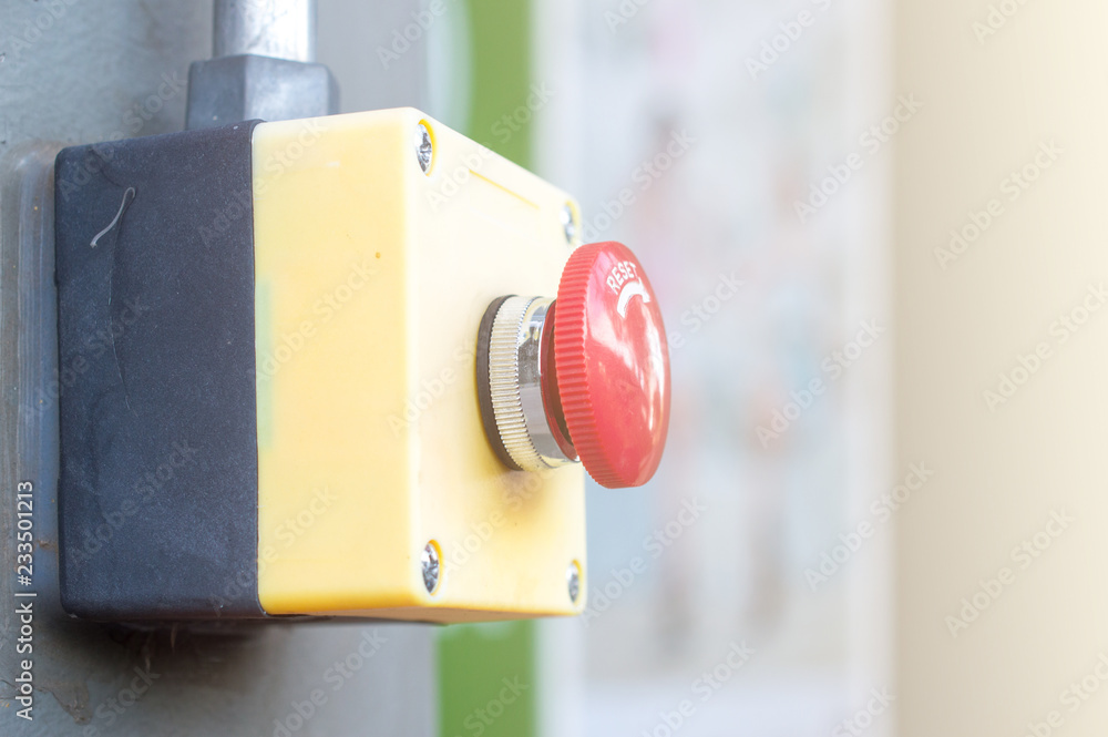 The red emergency button or stop button for industrial machine ...