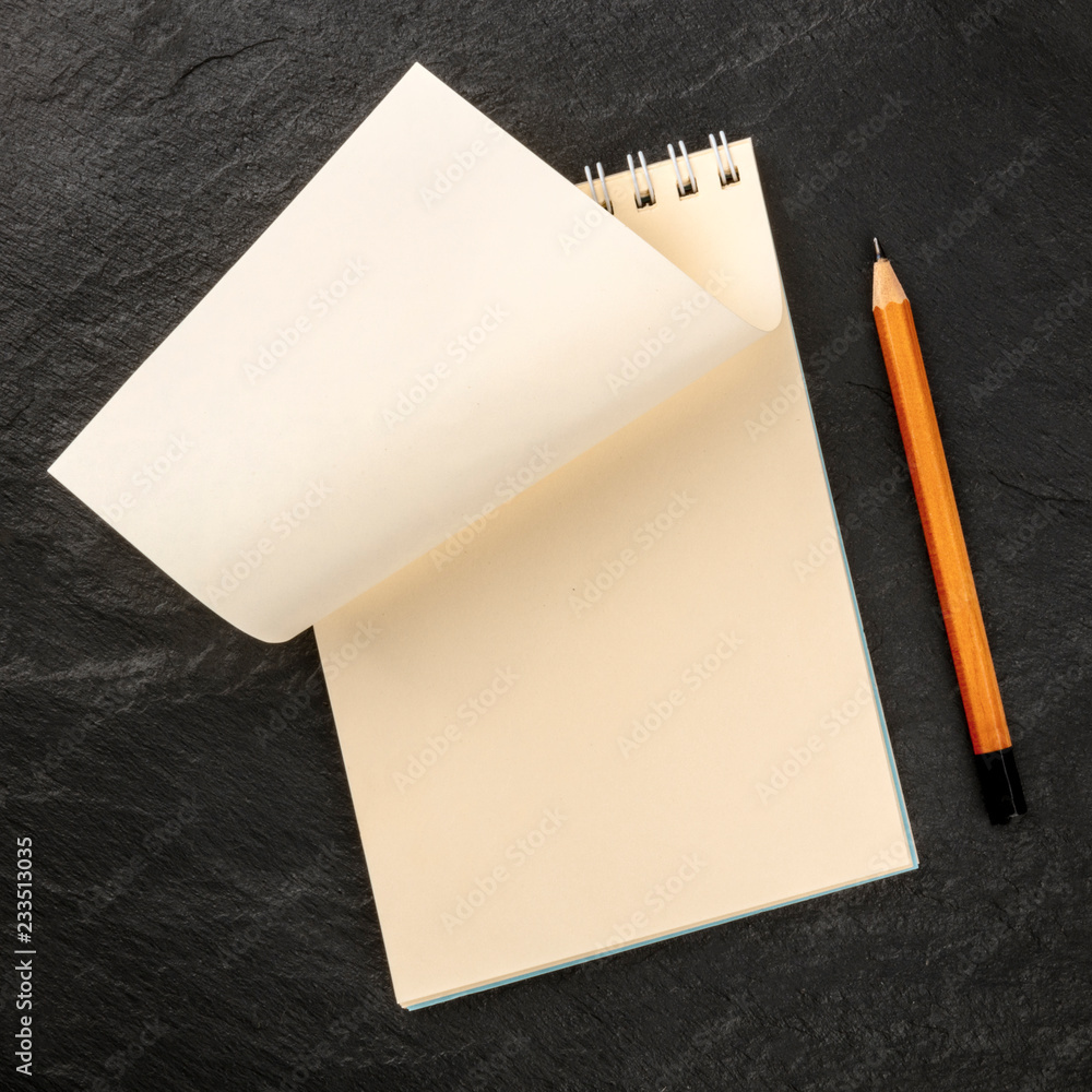 Turning a New Page. A photo of a spiral note pad with a blank sheet of ...