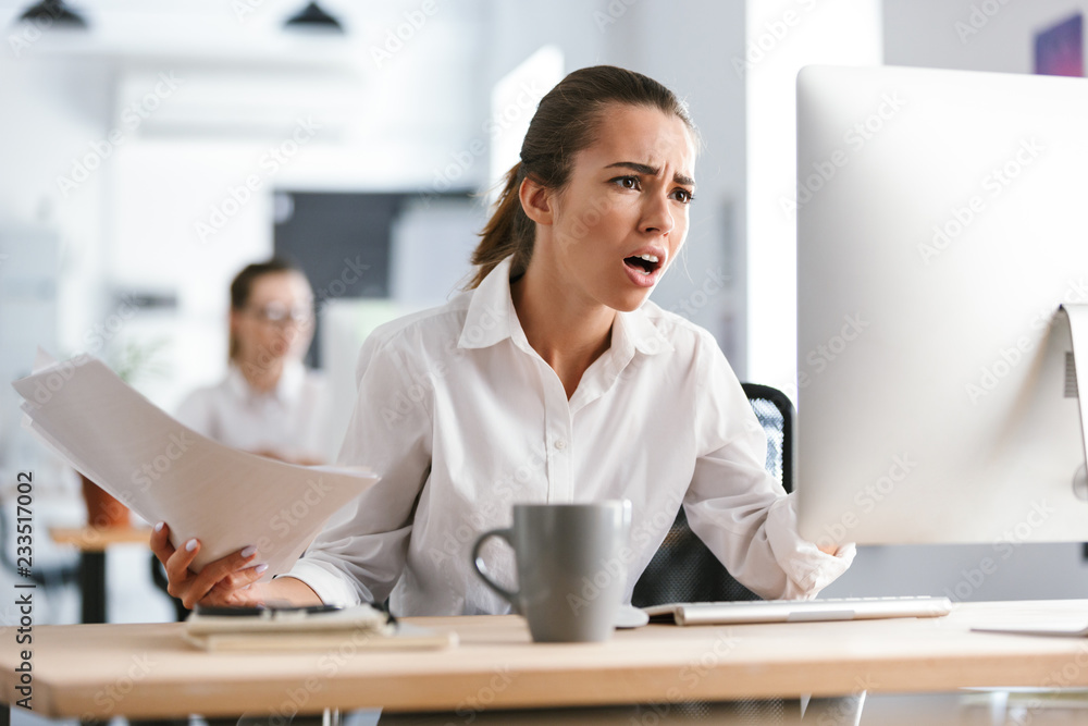 Confused Woman At Computer
