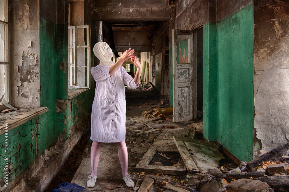 A ghost nurse or a zombie nurse or doctor with a tightly bandaged head ...