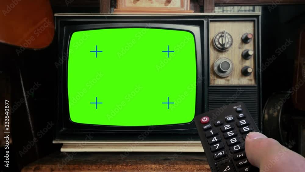 Changing Channels TV Vintage Zoom In Green Screen Television. Male hand ...