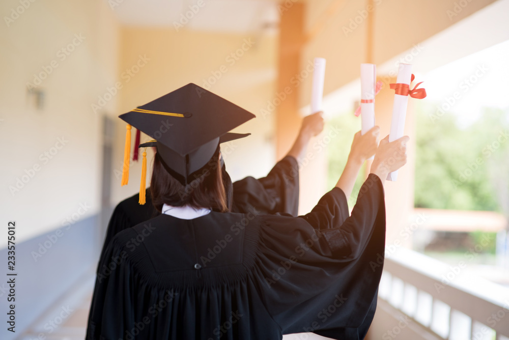 Black graduates wear black suits on graduation day at university. Stock ...