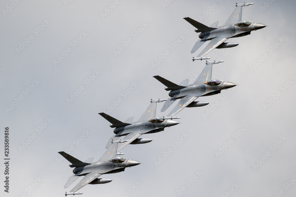 Military fighter jet aircraft formation in flight Stock Photo | Adobe Stock