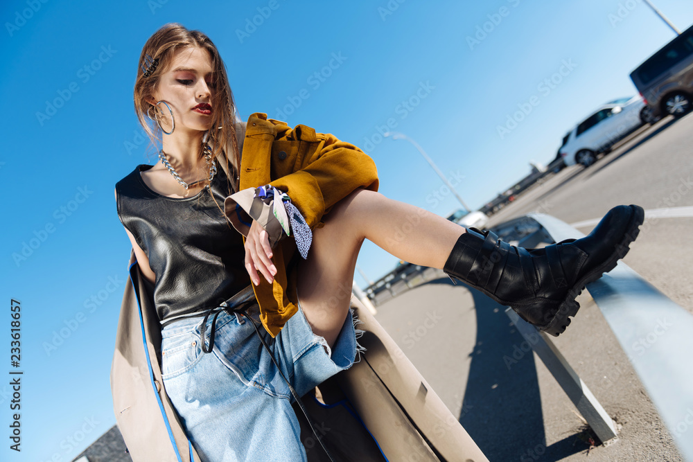 Foto de Young model working for famous magazine posing in denim shorts ...