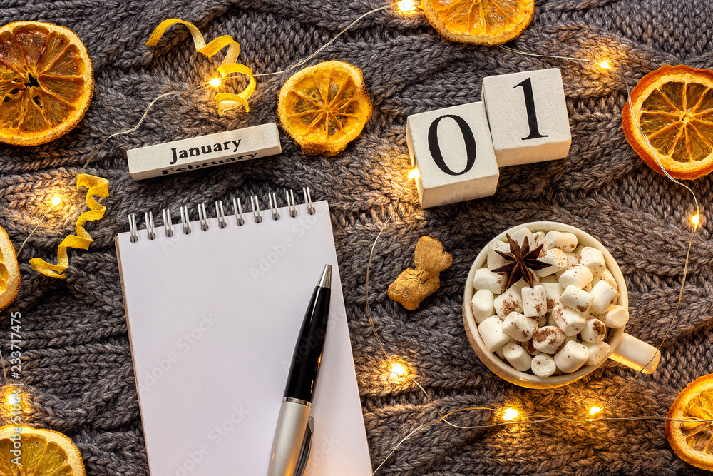 calendar January 1st Cup of cocoa and empty open notepad Stock Photo ...