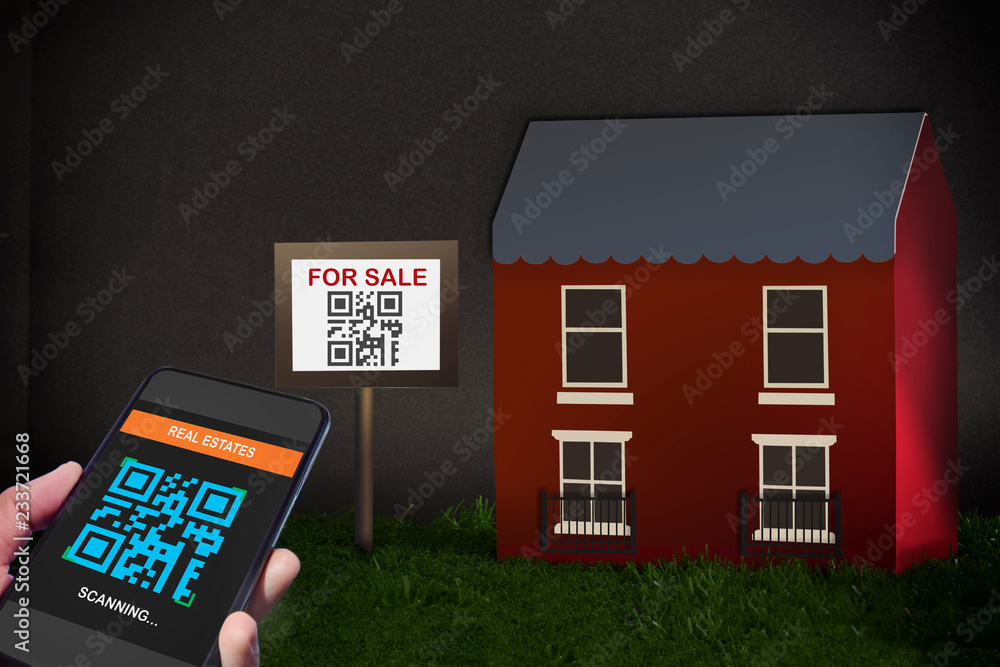 Hand holding smartphone with scanning QR code house for sale screen ...