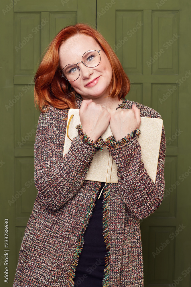 Happy Caucasian ginger haired female student in spectacles, has ...