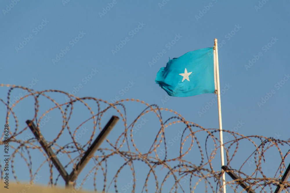 The Somali flag of Somalia, light blue with a five-sided white star ...