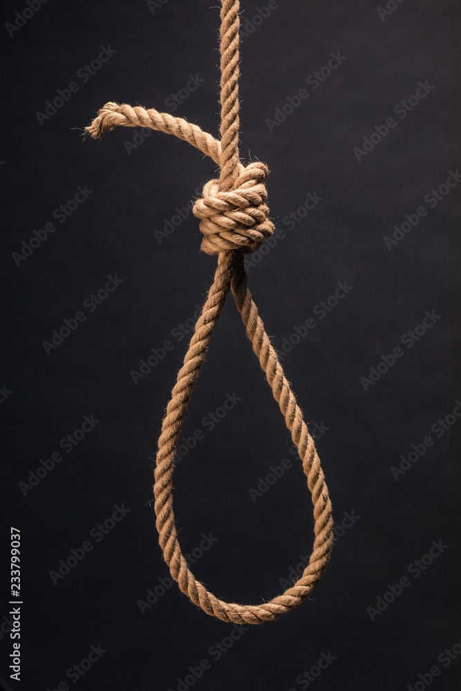 Noose. The concept of murder or suicide. On dark background Stock Photo ...