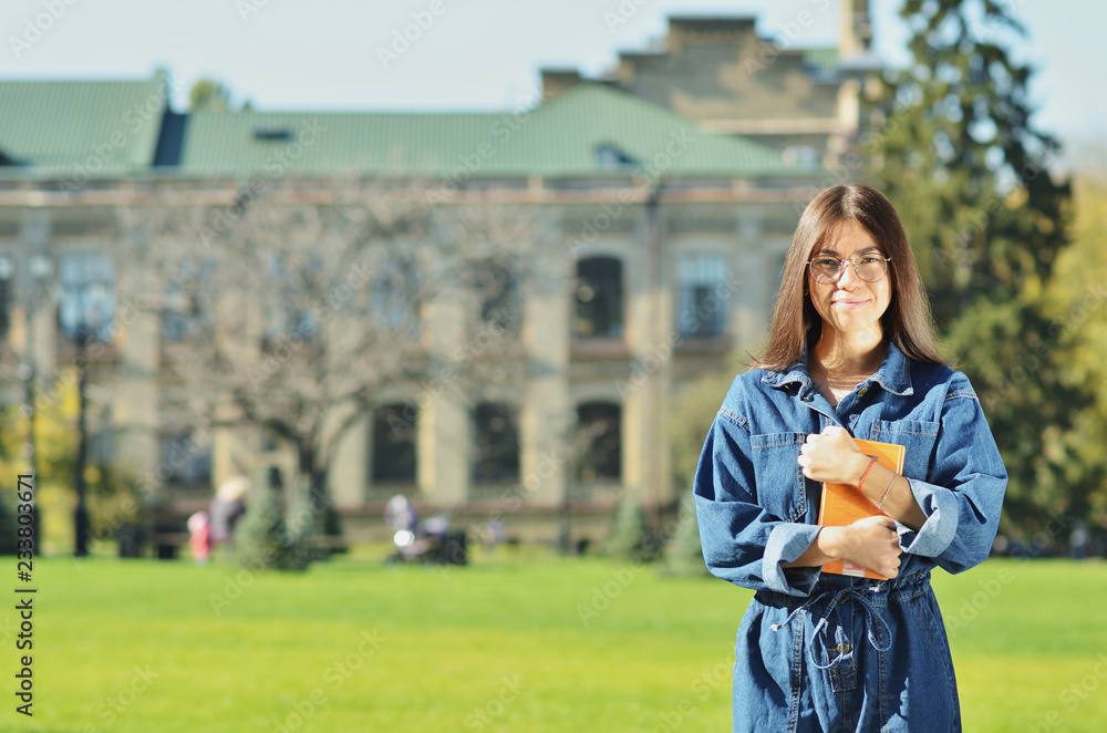 Portrait Of Female University Student On Campus Stock Photo | Adobe Stock
