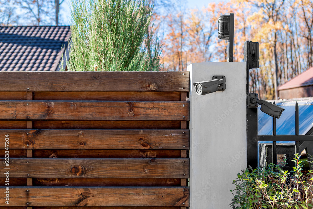 CCTV cameras on the wall. Monitor the security of a multi-story ...