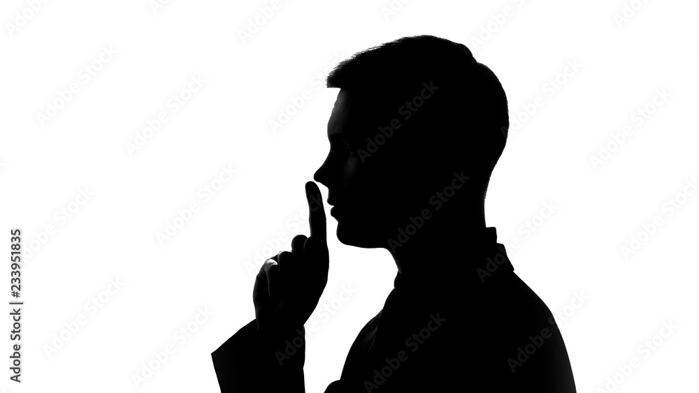 Man showing gesture of silence, non disclosure of secret data, fingers ...