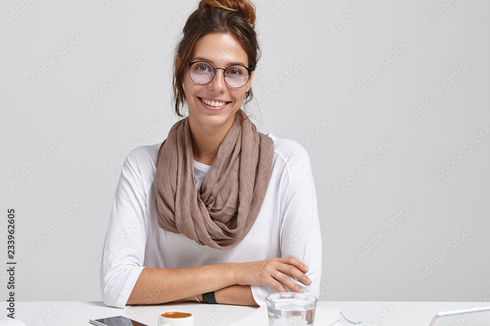 Image of creative clever journalist wears transparent glasses, keeps ...