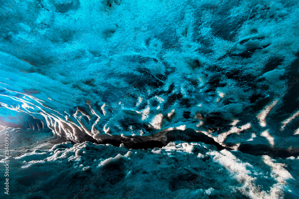 Blue ice cave view during winter in Jokulsarlon, Iceland Stock Photo ...
