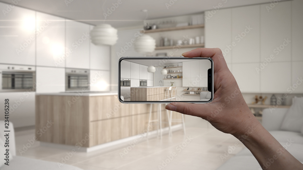Hand holding smart phone, AR application, simulate furniture and ...