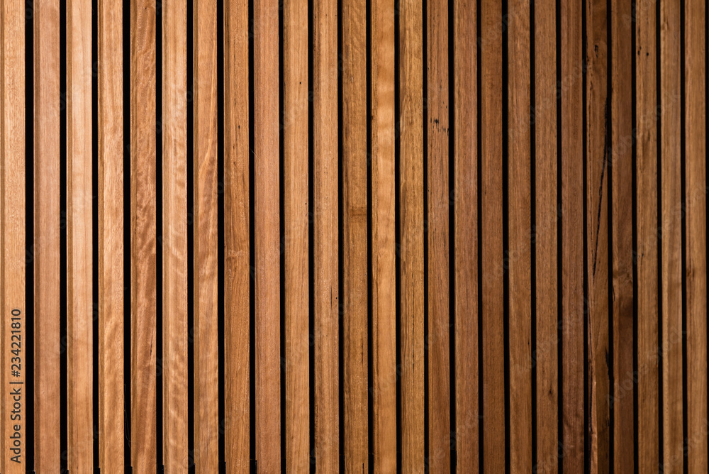 Background of interior vertical timber panelling with subtle fall off ...