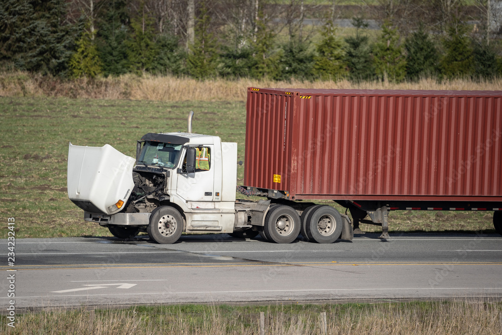 A Broken Semi Truck on the Side of the Road with its Hood Up Foto Stok ...