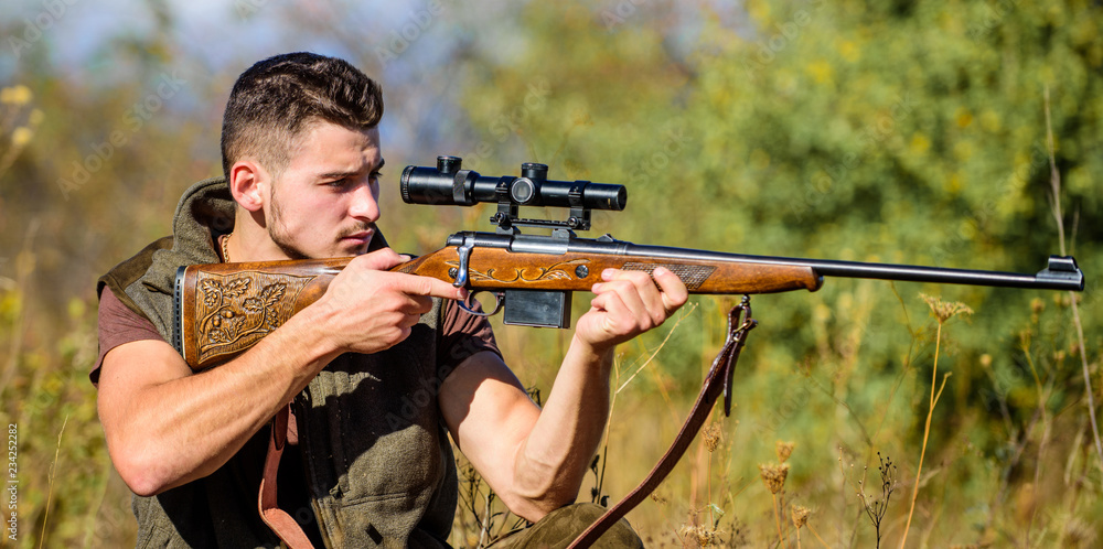Guy hunting nature environment. Hunting weapon gun or rifle. Hunting ...